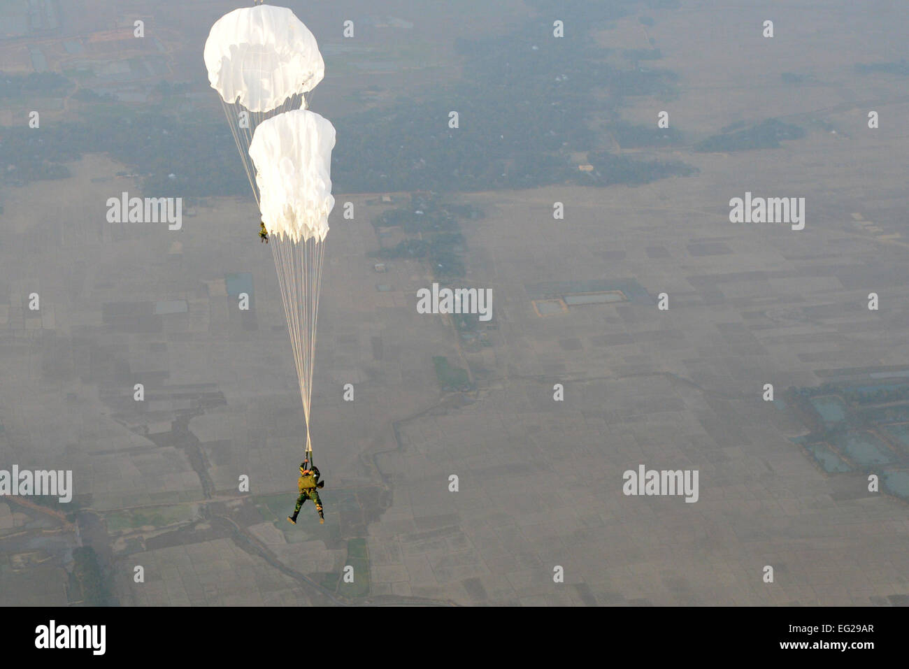 Bangladeshi commandos jump from a U.S. Air Force C-130H aircraft over a ...