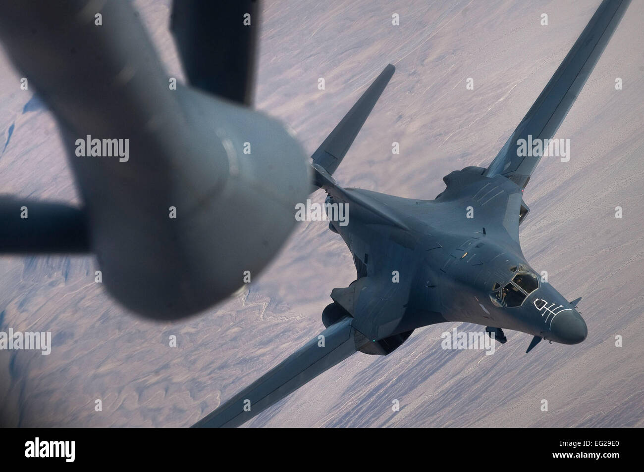 A B-1B Lancer approaches a KC-135 Stratotanker after being refueled ...