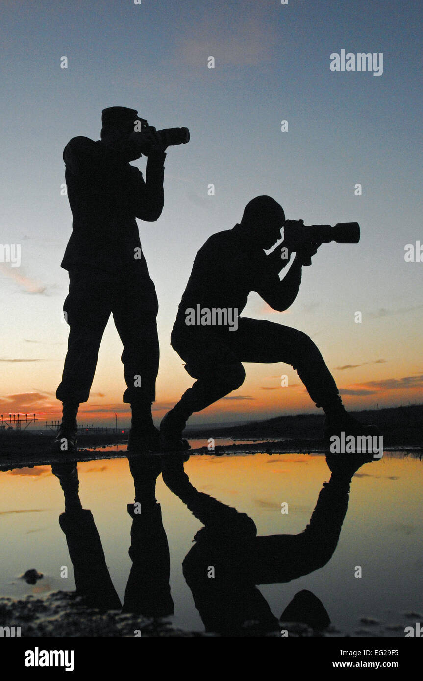 Airmen 1st Class Tony R. Ritter and Kenny Holston capture images of ...
