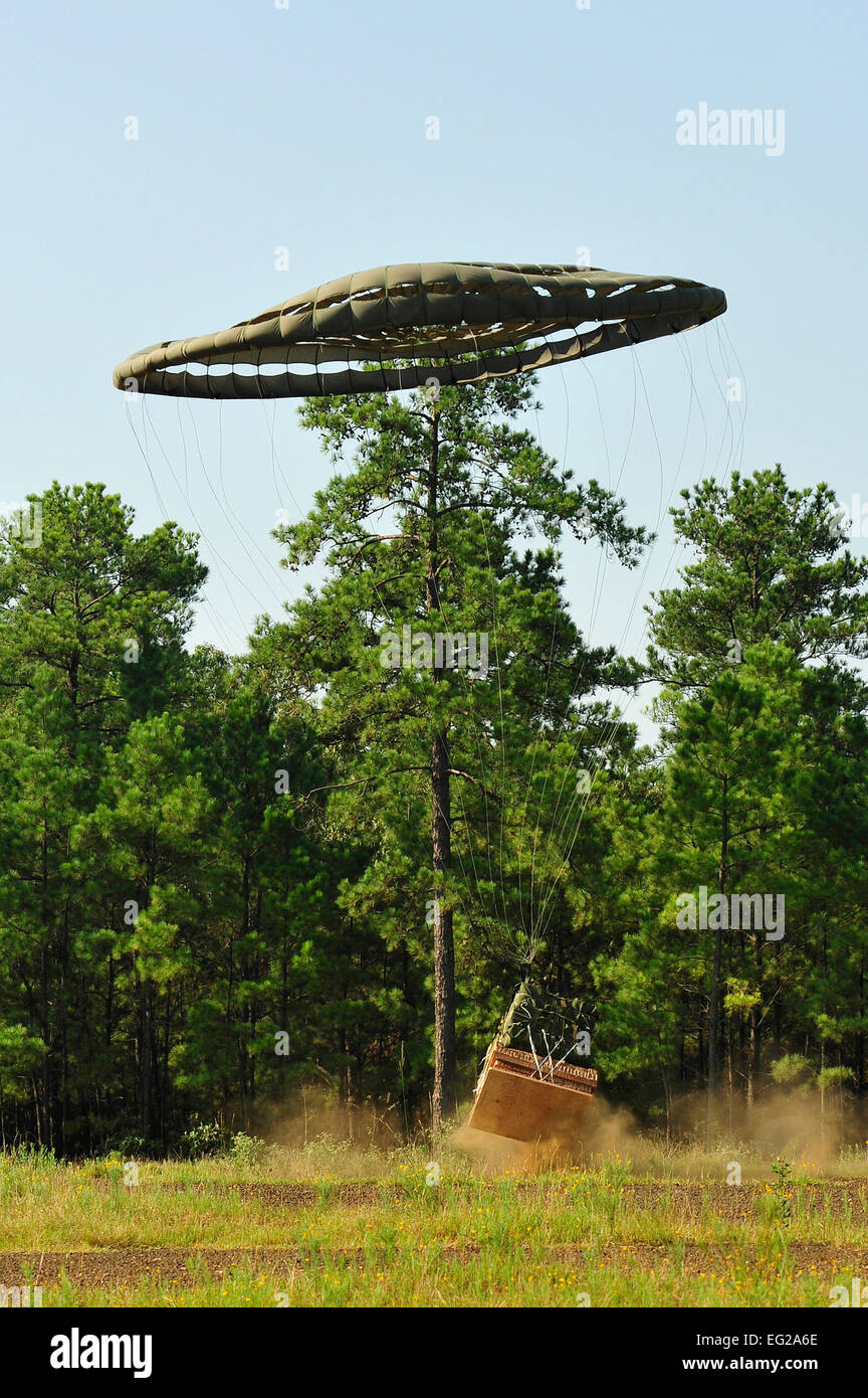 A container delivery system bounces after impacting the drop zone at ...