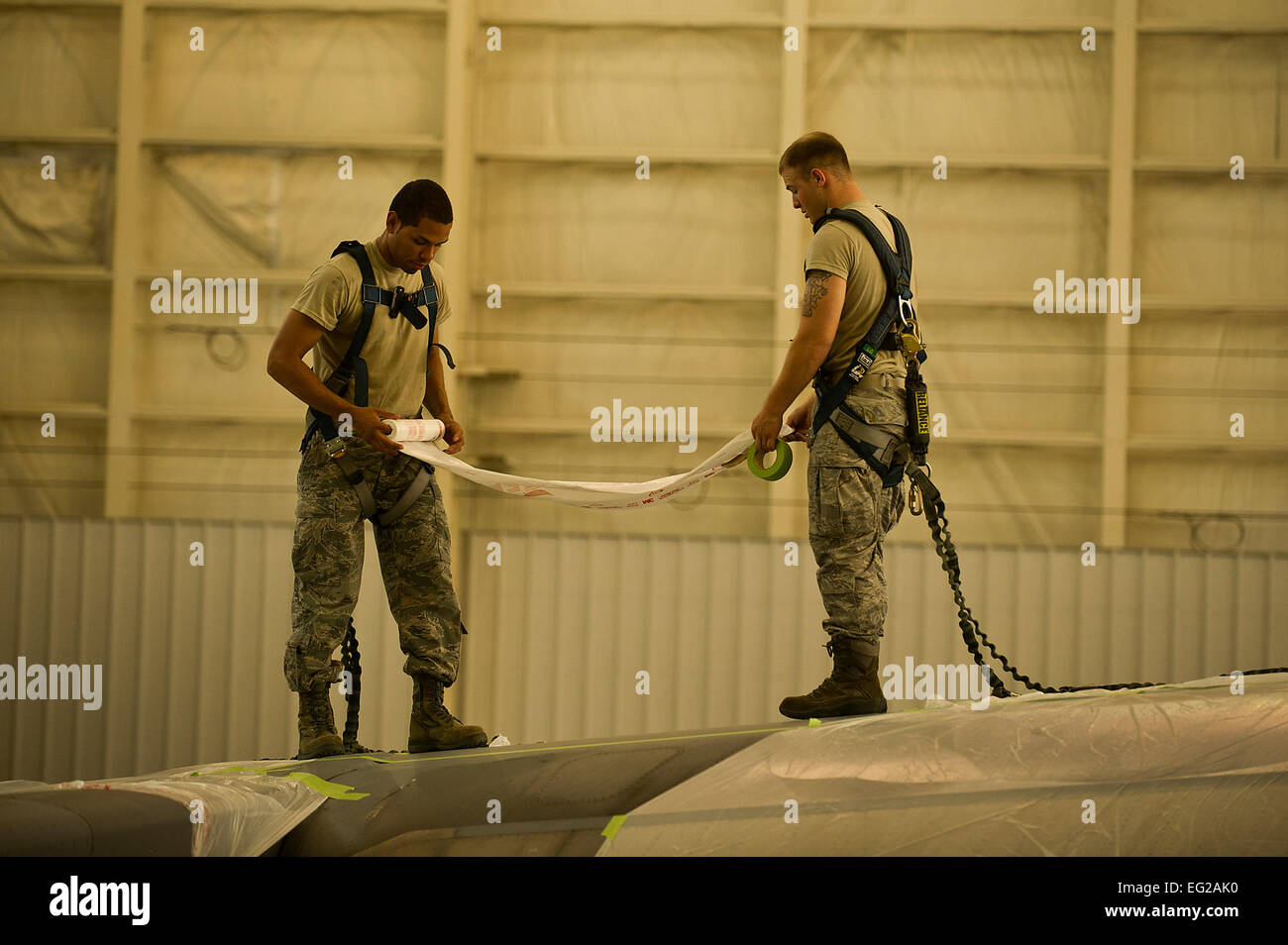 U.S. Air Force Senior Airman Ken Spruell and Airman 1st Class Justin ...