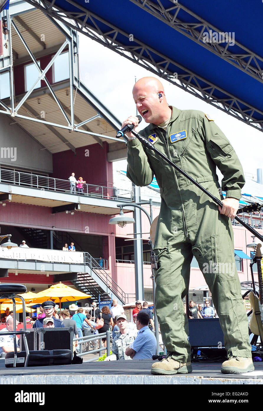 Master Sgt. Ryan Carson, male vocalist for Max Impact, performs during ...