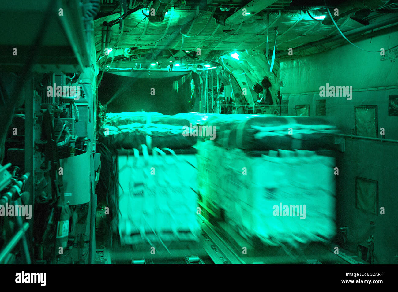 Sixteen cargo bundles roll out the ramp of a 774th Expeditionary ...