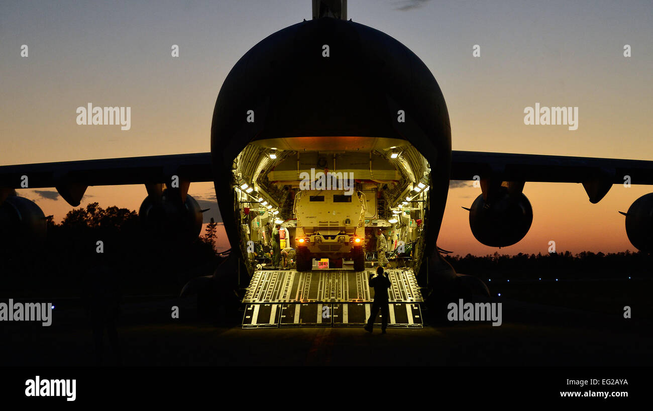 Staff Sgt. Robert Clark directs anArmy M142 High Mobility Artillery ...