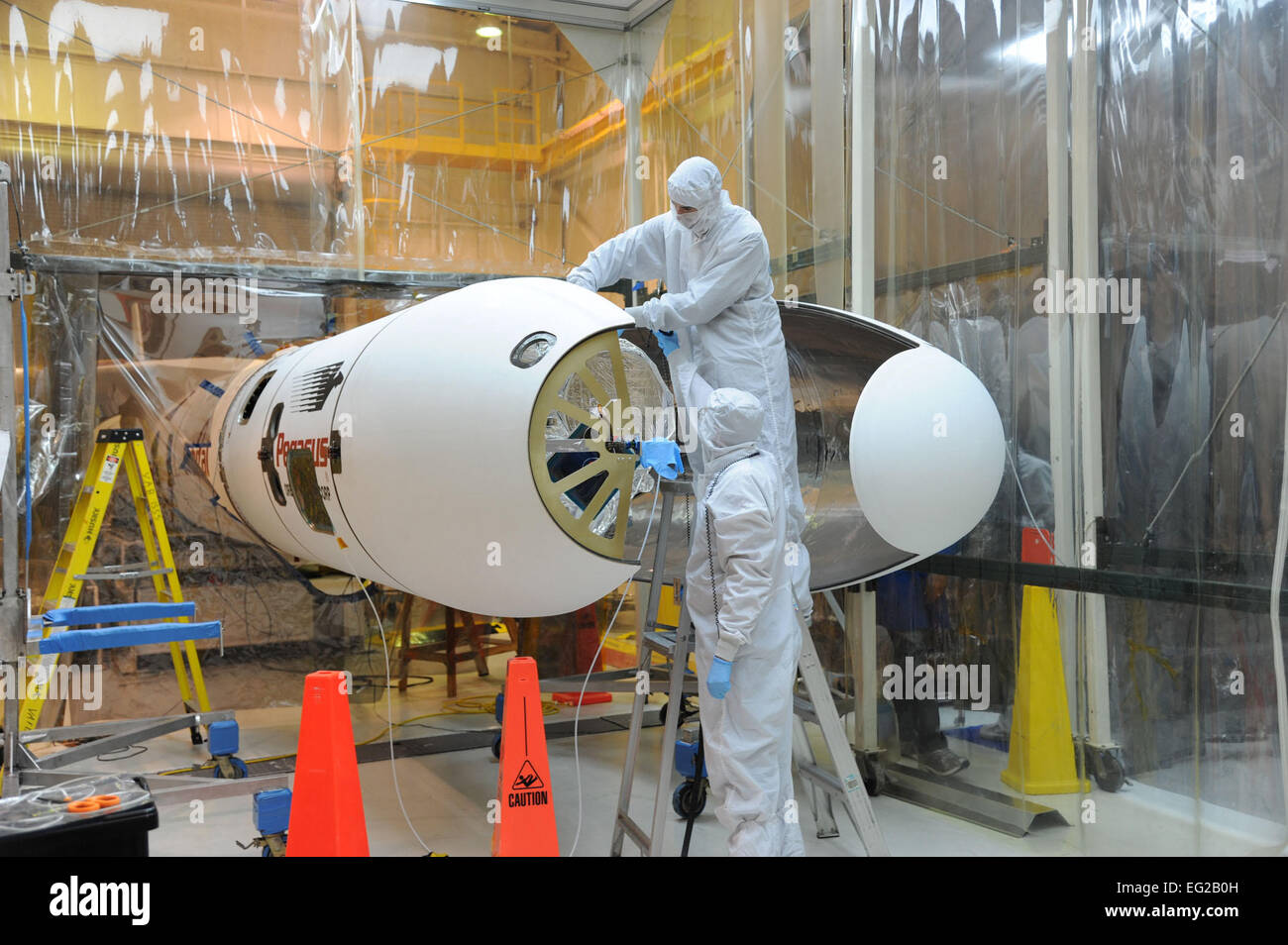 A fairing is put around NASA's NuStar and an Orbital Pegasus rocket at ...