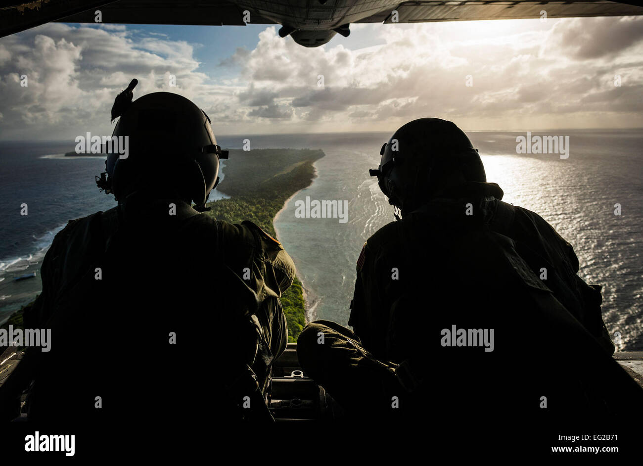 Senior Airman Timothy Oberman left and Staff Sgt. Nick Alarcon watch ...