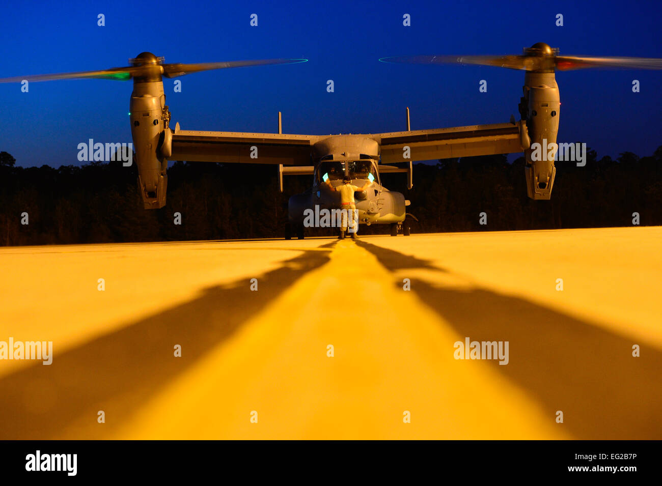 A U.S. Air Force CV-22 Osprey tiltrotor aircraft sits on the flight ...