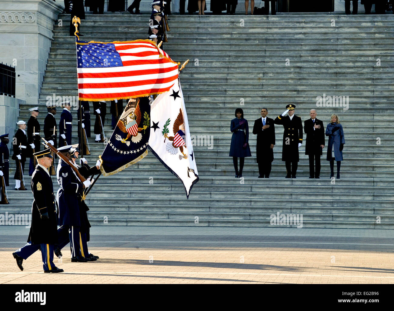 Members of the Joint Armed Forces Color Guard perform pass in review ...