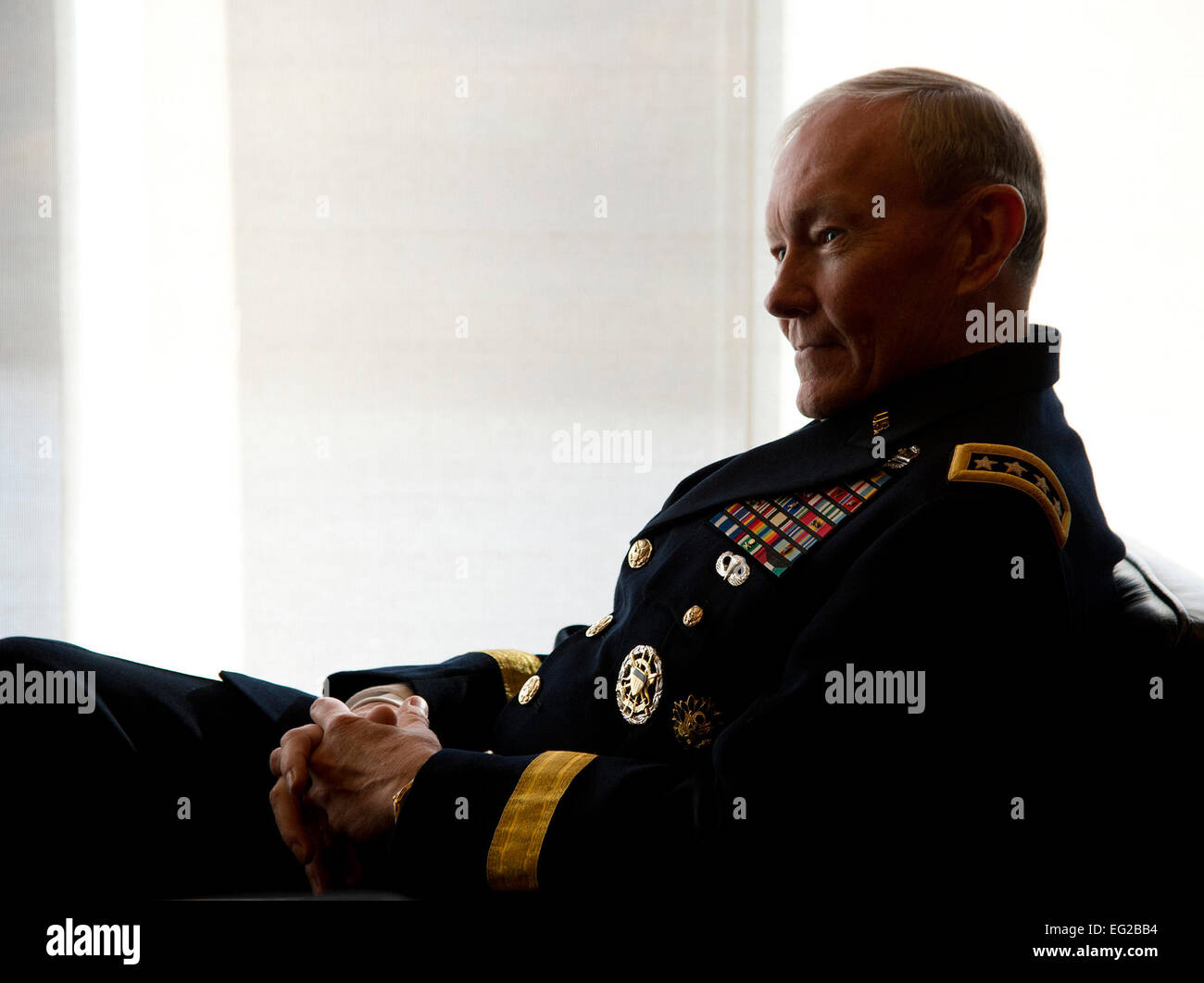 Army Gen. Martin E. Dempsey speaks with friends before a retirement ...