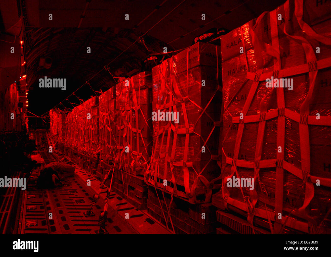 Bundles of Halal meals sit aboard a C-17 Globemaster III for a ...