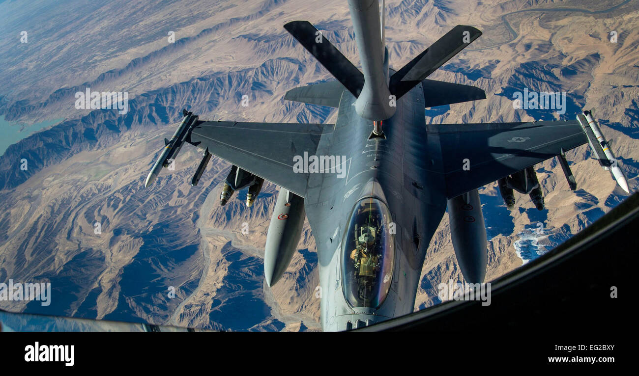 A KC-135 Stratotanker refuels an F-16 Fighting Falcon over Afghanistan ...