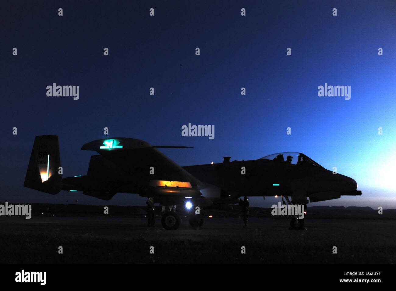 Maintainers from the 81st Fighter Squadron pull out firing pins and ...