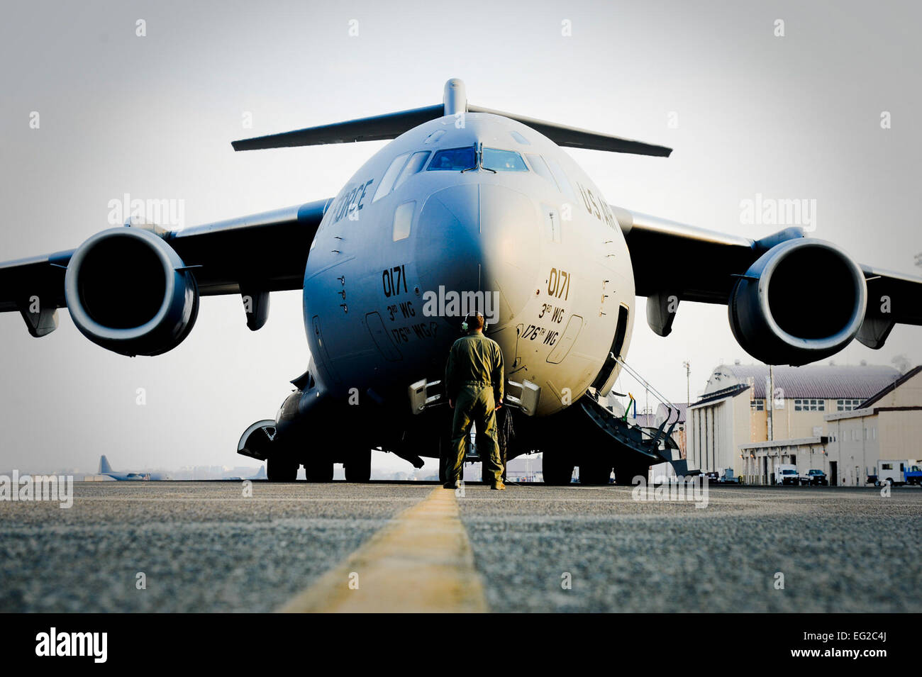 U.S. Air Force Tech. Sgt. Mark Shertzer watches as the engines of a C ...