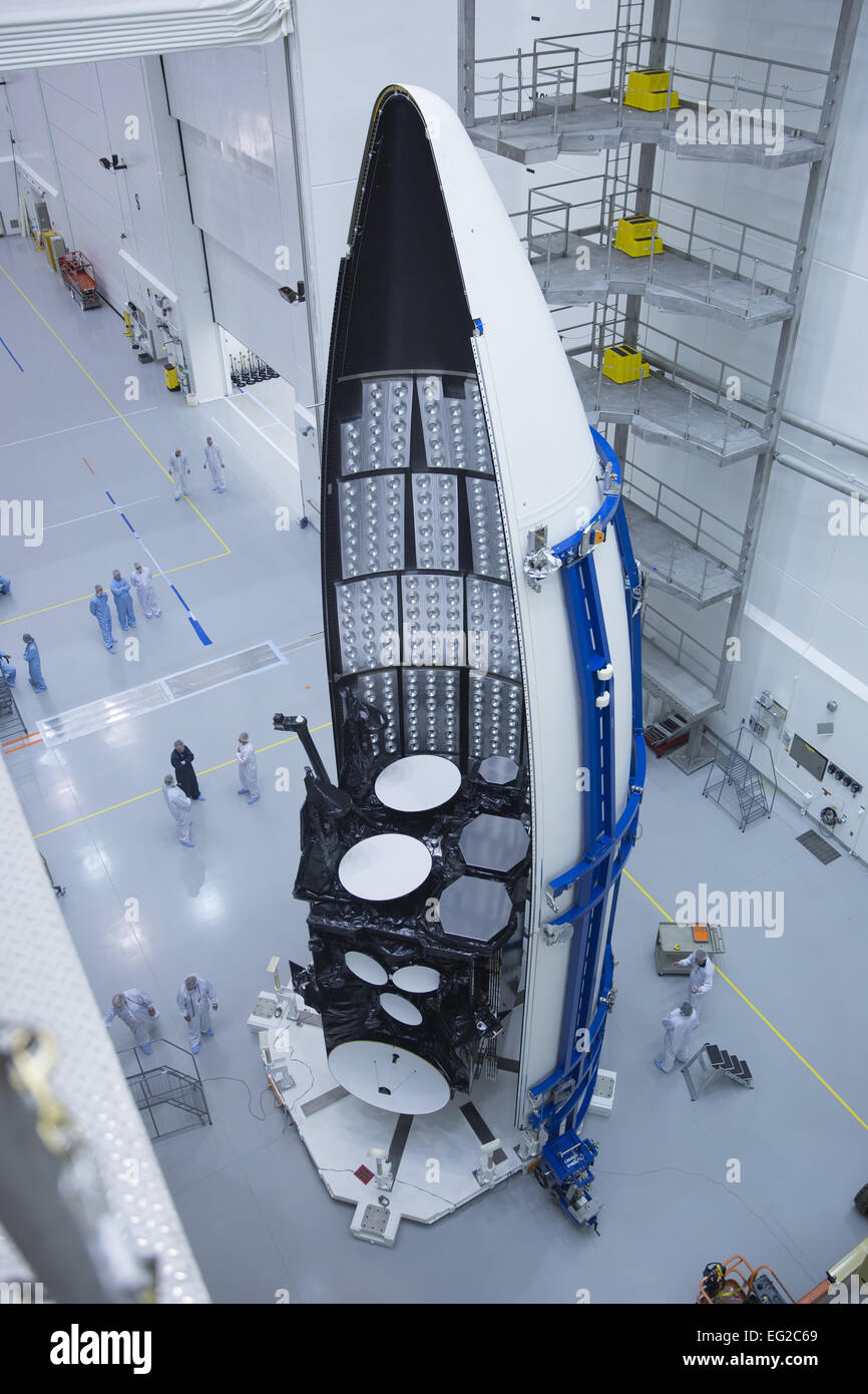 Workers prepare the Air Force's third Advanced Extremely High Frequency ...