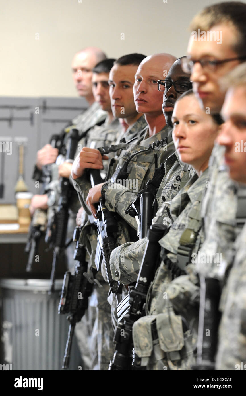 Defenders from the 386th Expeditionary Security Forces Squadron listen ...