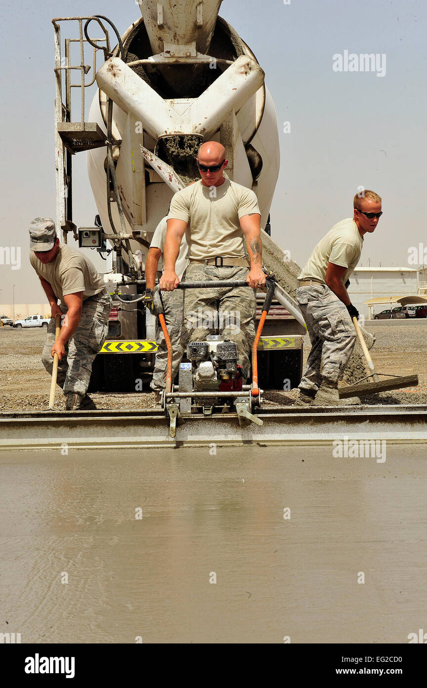Airmen assigned to the 380th Expeditionary Civil Engineer Squadron lay ...