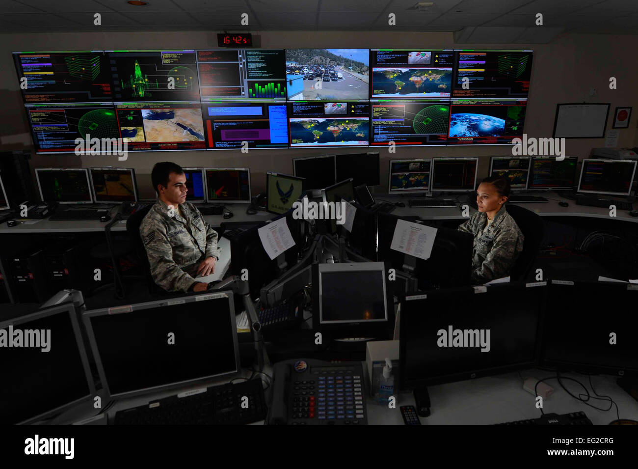 Staff Sgt. Alex Garviria and 2nd Lt. Rachel James work in the Global Strategic Warning and Space ...