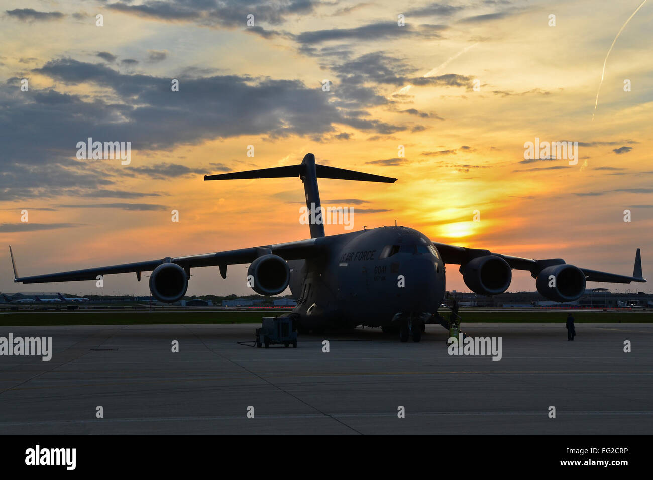 The sun sets on a U.S. Air Force C-17 Globemaster III cargo aircraft in Milwaukee on May 11 ...