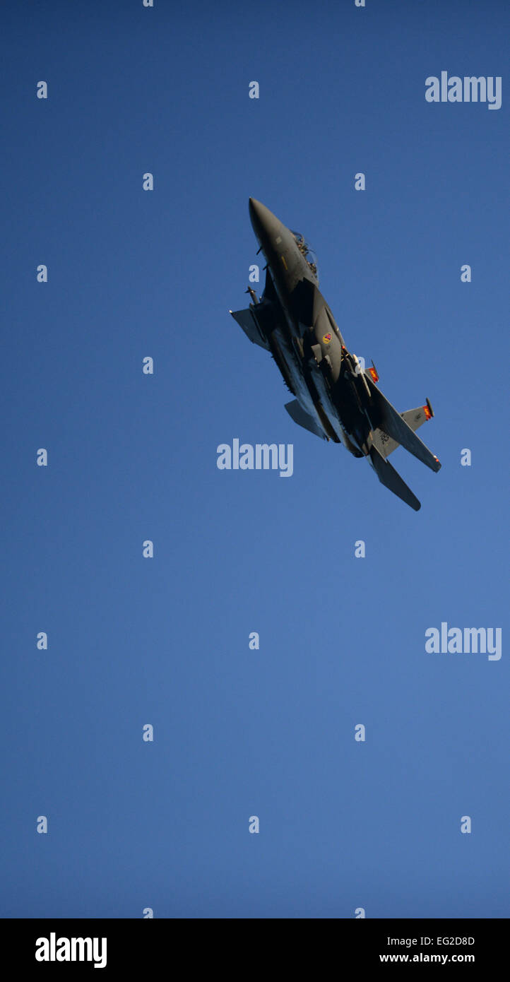 An F-15E Strike Eagle flies by after a simulated airstrike during ...