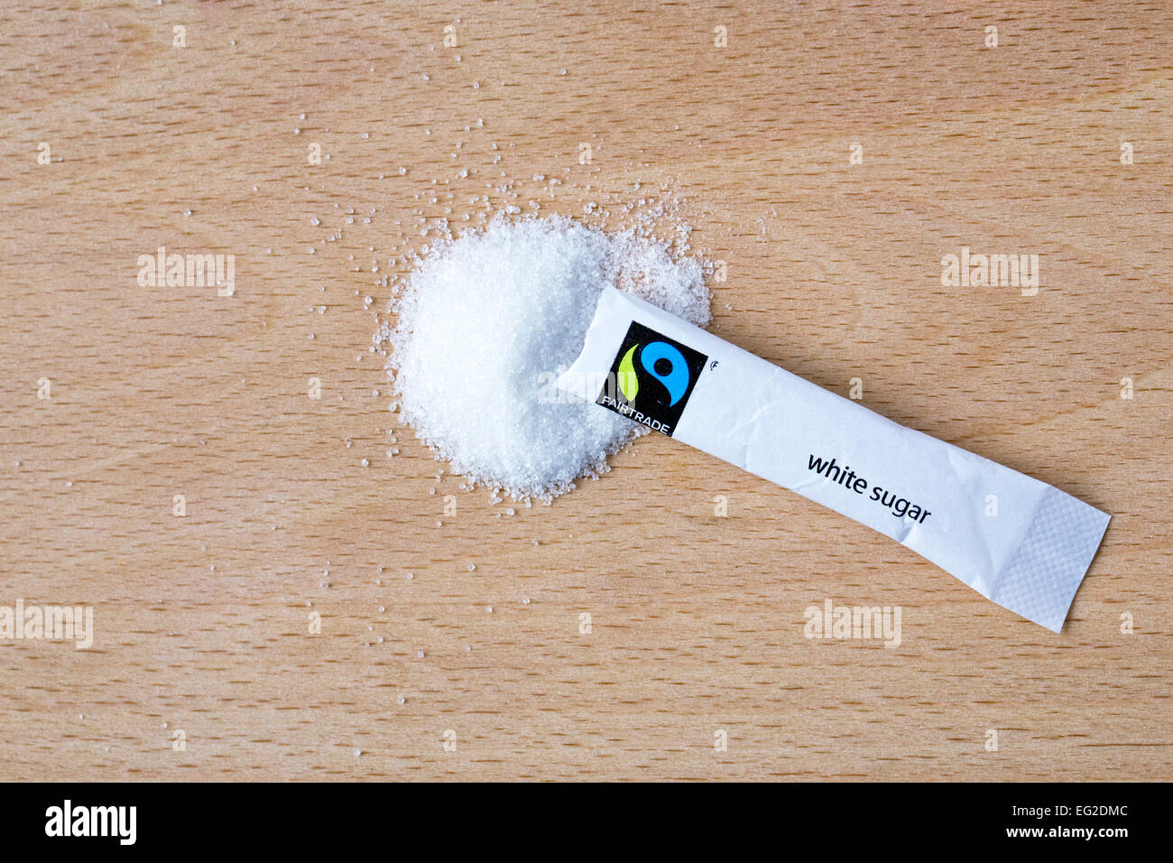Single white sugar stick on a wooden board Stock Photo - Alamy