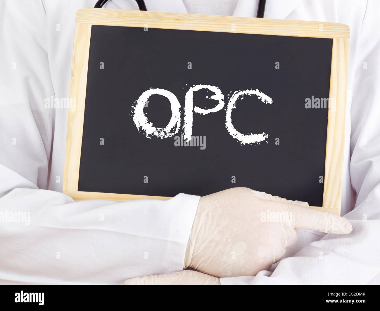Doctor shows information on blackboard: OPC Stock Photo - Alamy