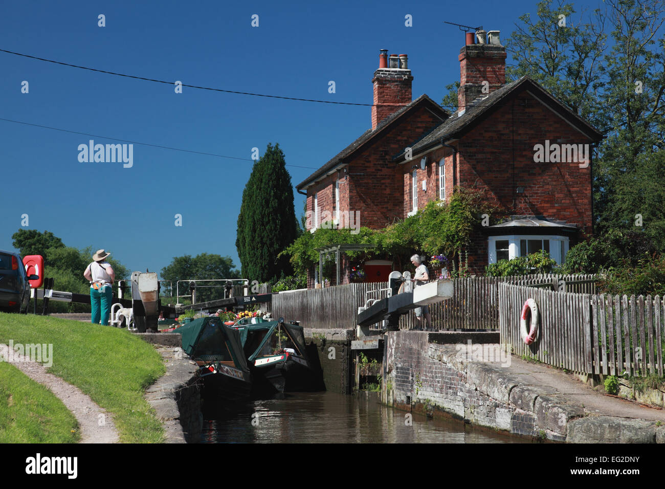 Two narrowboats emerging from Shardlow Lock No. 2 on the Trent and ...