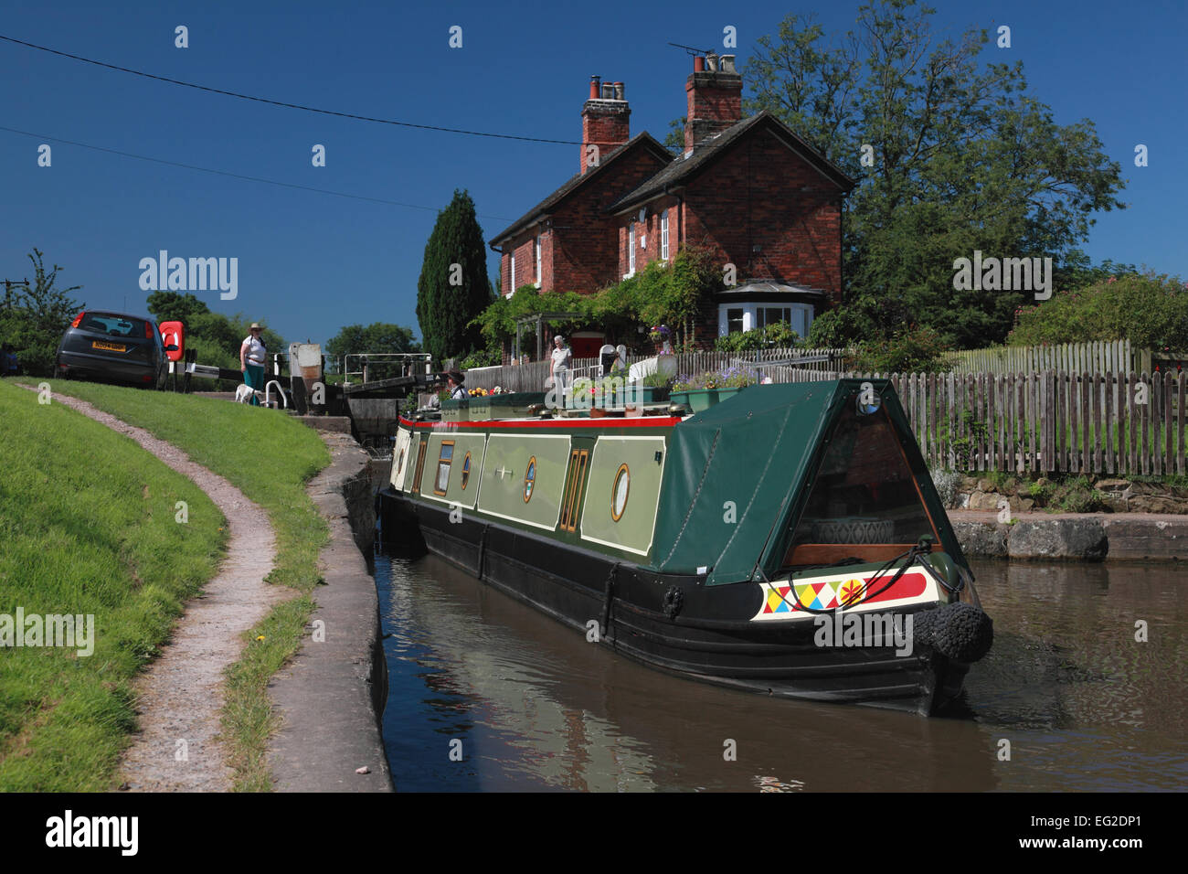 A narrowboat emerging from Shardlow Lock No. 2 on the Trent and Mersey ...