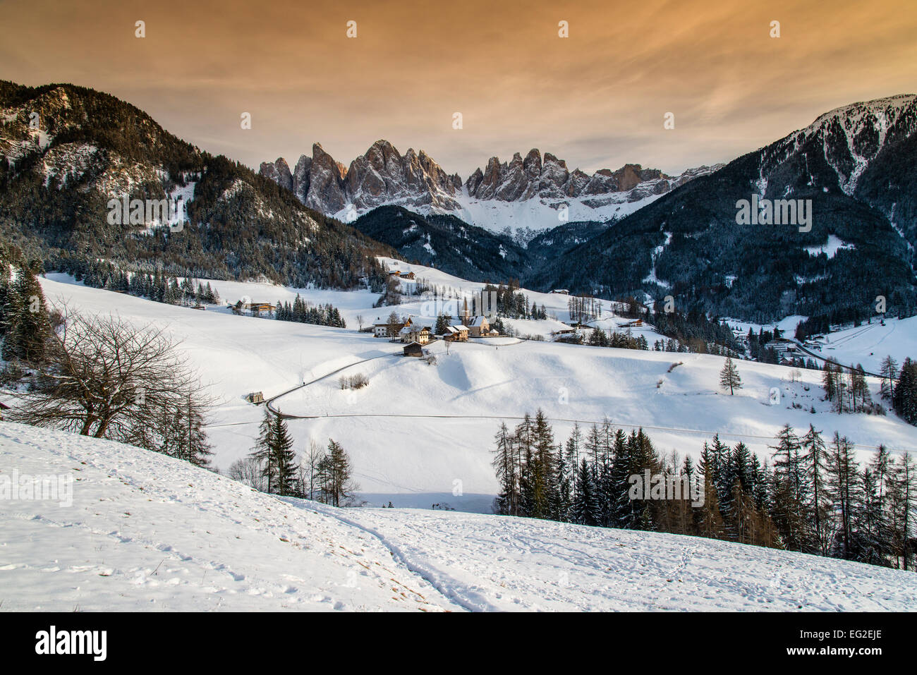 Scenic winter view of Vilnoss or Val di Funes with Puez-Geisler ...