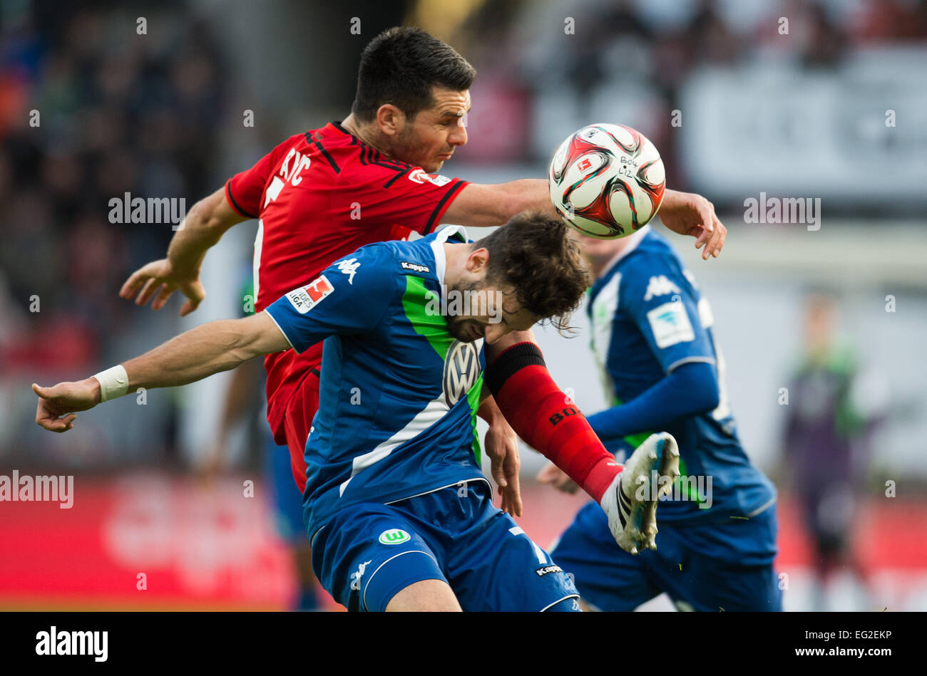 Leverkusen, Germany. 14th Feb, 2015. Leverkusen's Emir Spahic (L) and ...