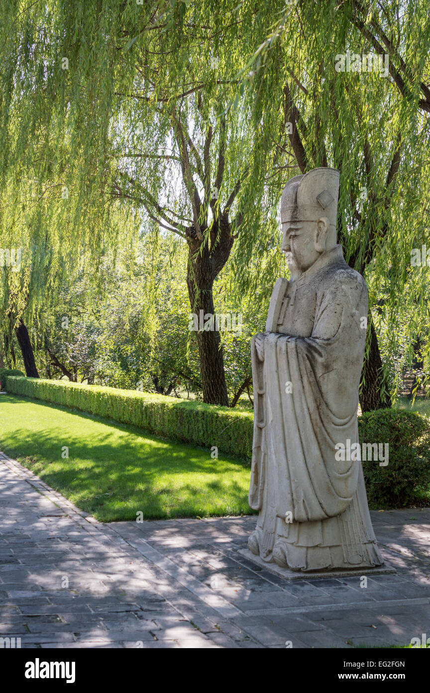 Carved statue on the tree-lined avenue, the Sacred Way of the Ming ...