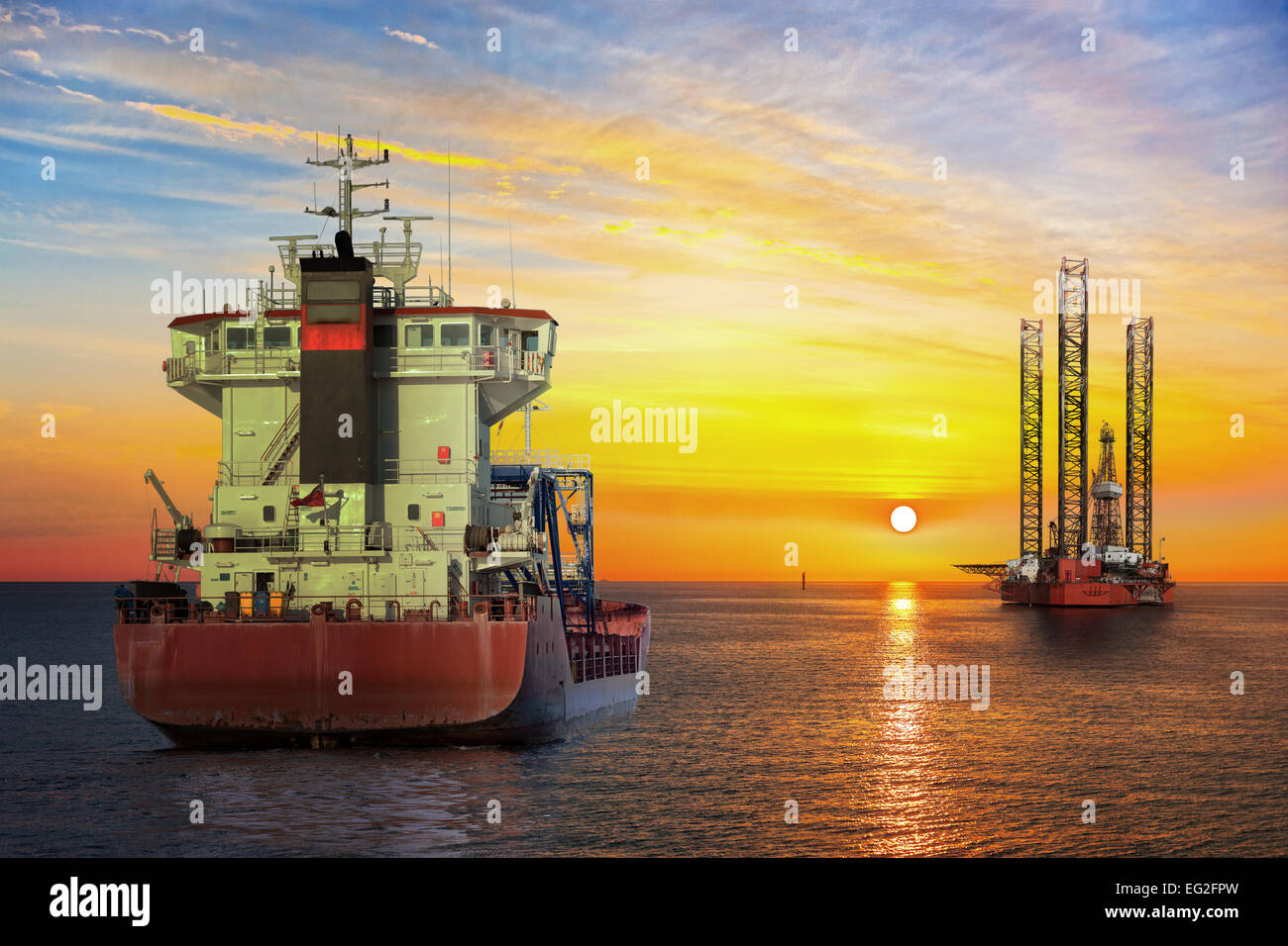 Tanker ship and Oil Platform on offshore area at sunset Stock Photo - Alamy