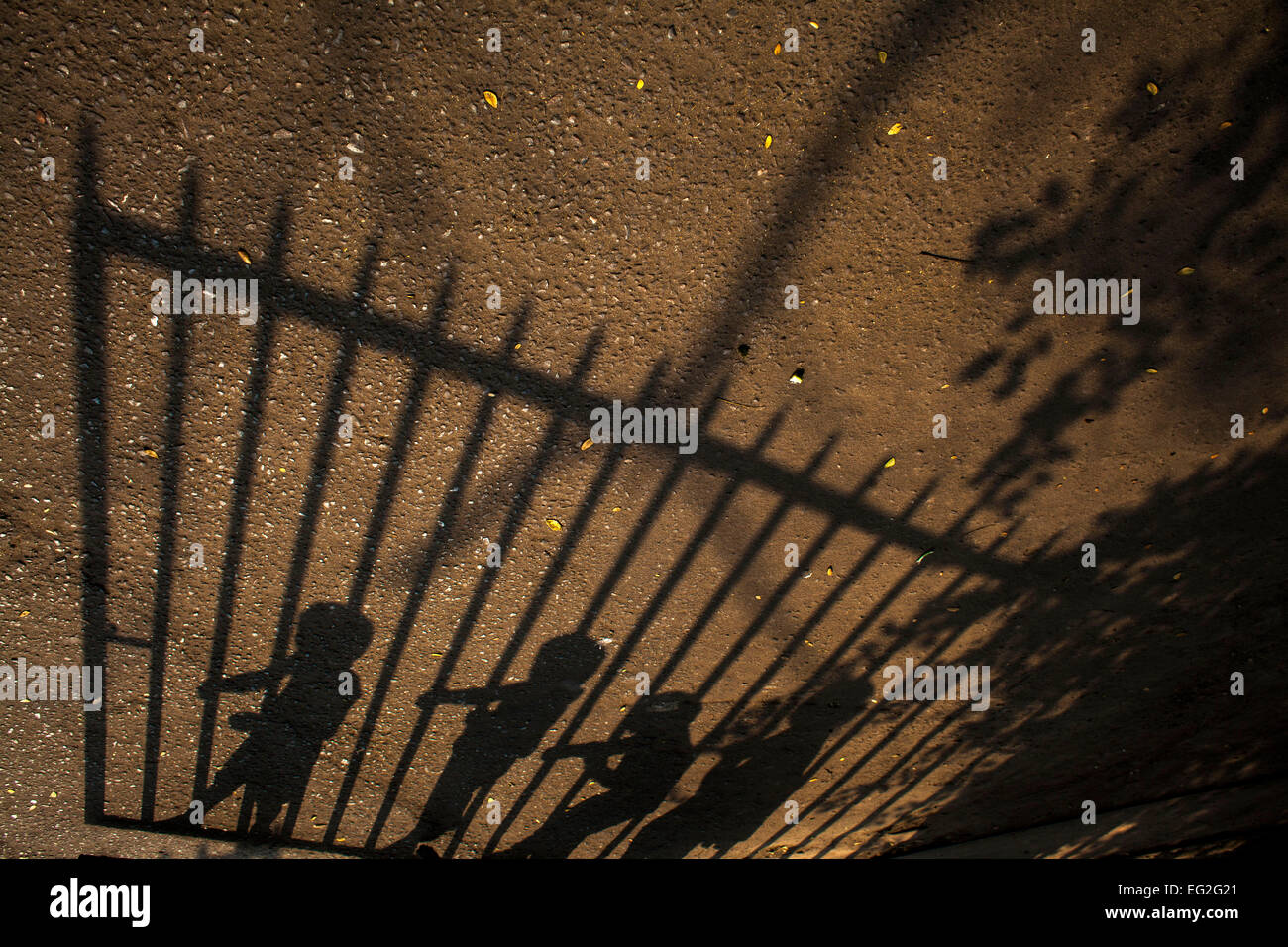 Homeless children playing in a office gate in dhaka Stock Photo - Alamy