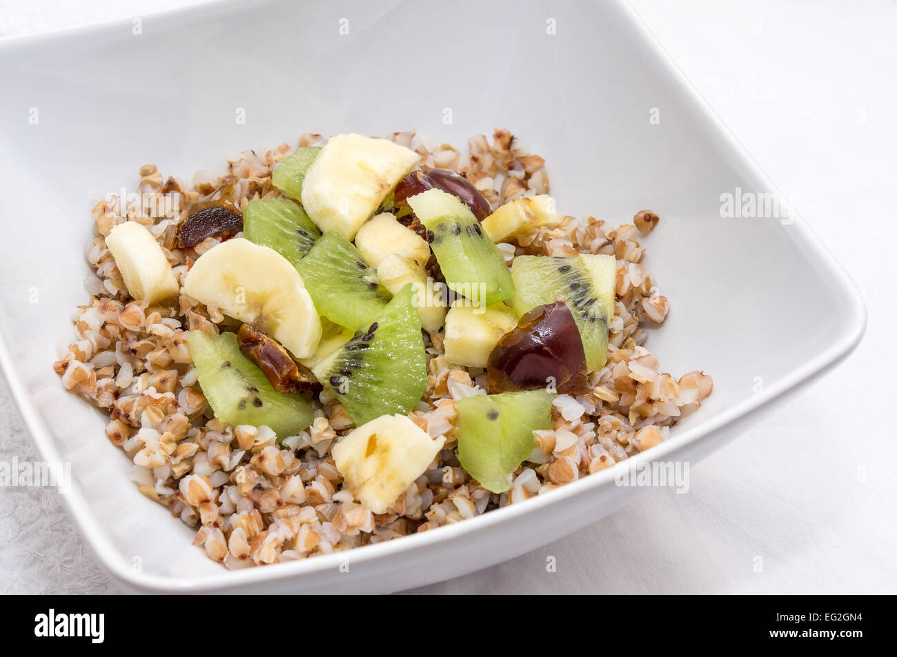 Healthy breakfast - Raw vegan fruit salad with buckwheat Stock Photo ...