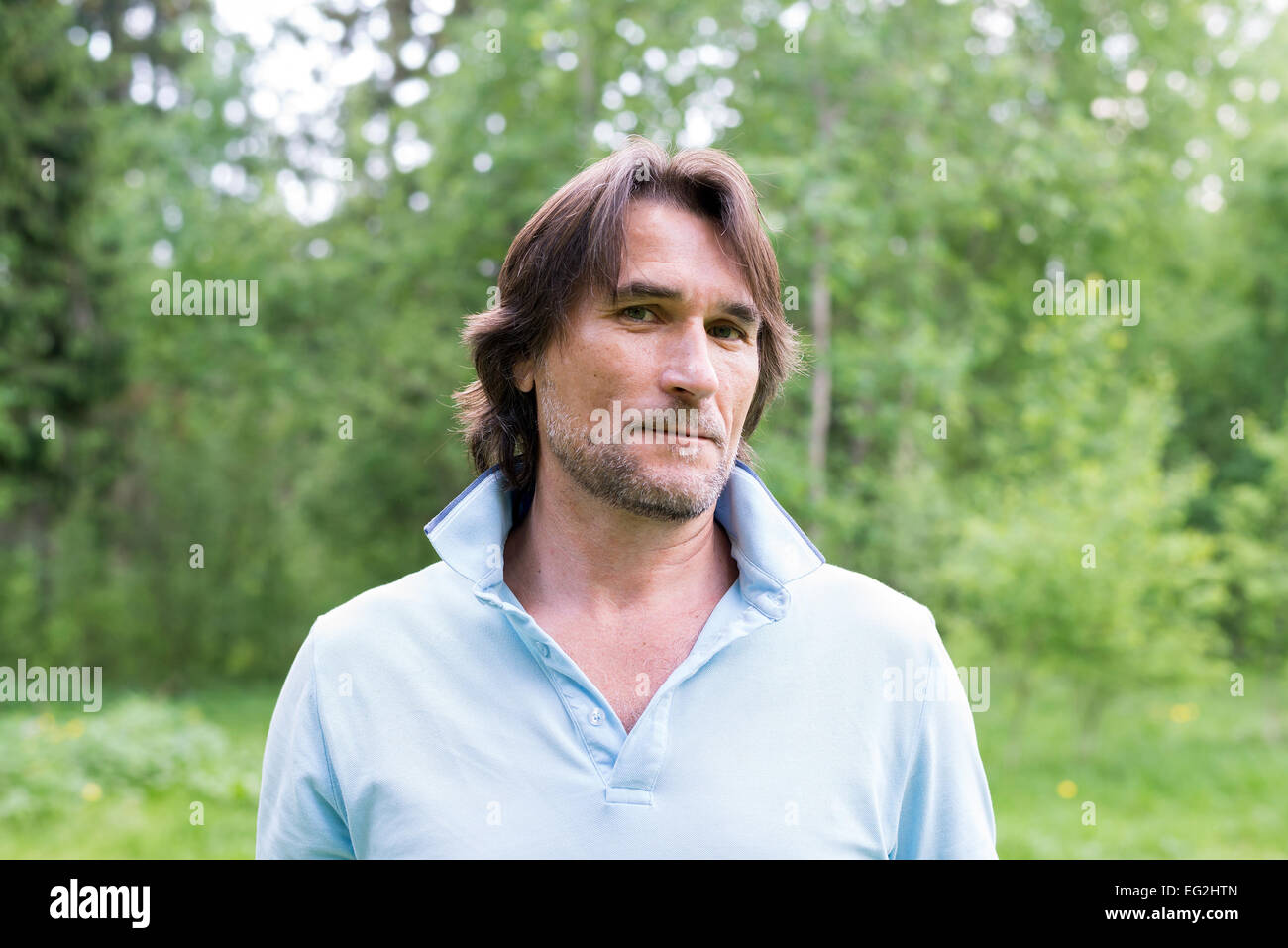 man with a stubble in the summer park Stock Photo - Alamy