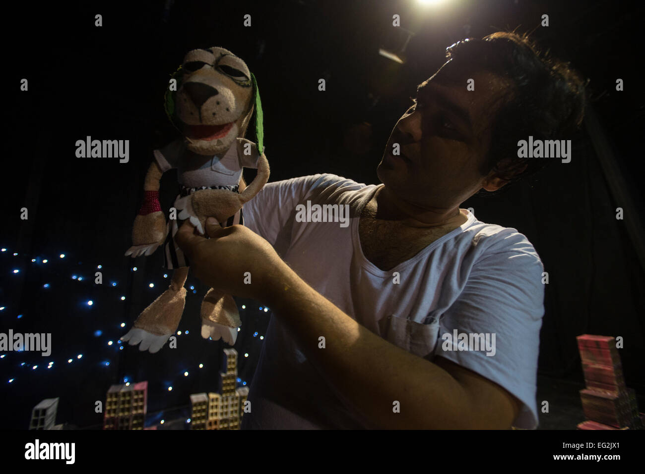 Actor shows his dog doll after the performance "I'll return beside the ...