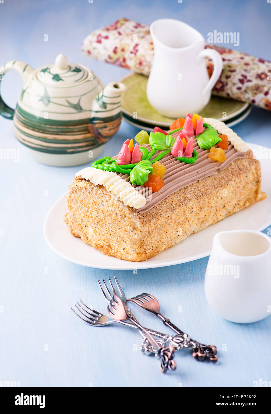 Roulade cake, decorated with colourful buttercream flowers. Yule Log ...