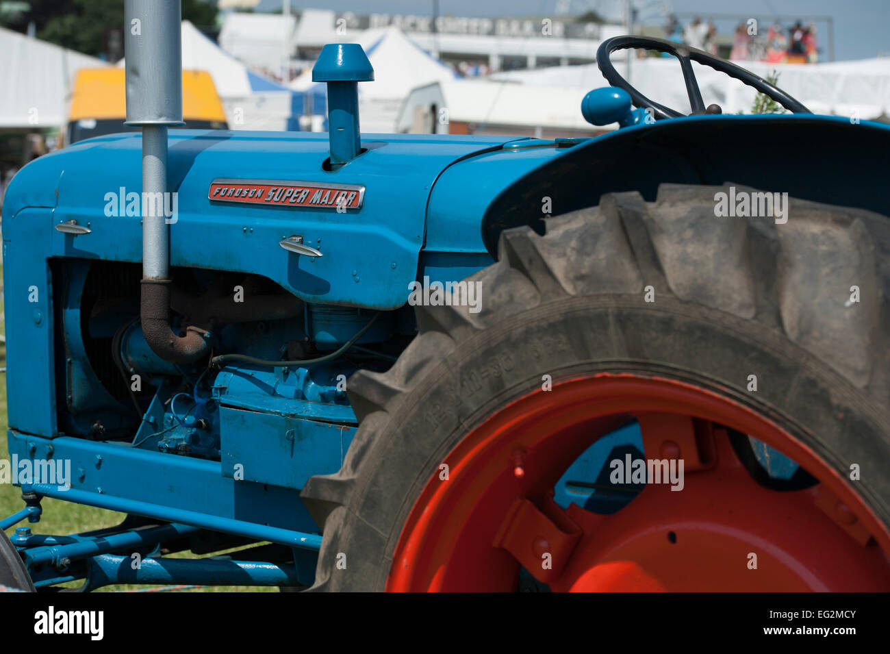 Partial, close-up of old, classic blue Fordson Super Major tractor ...
