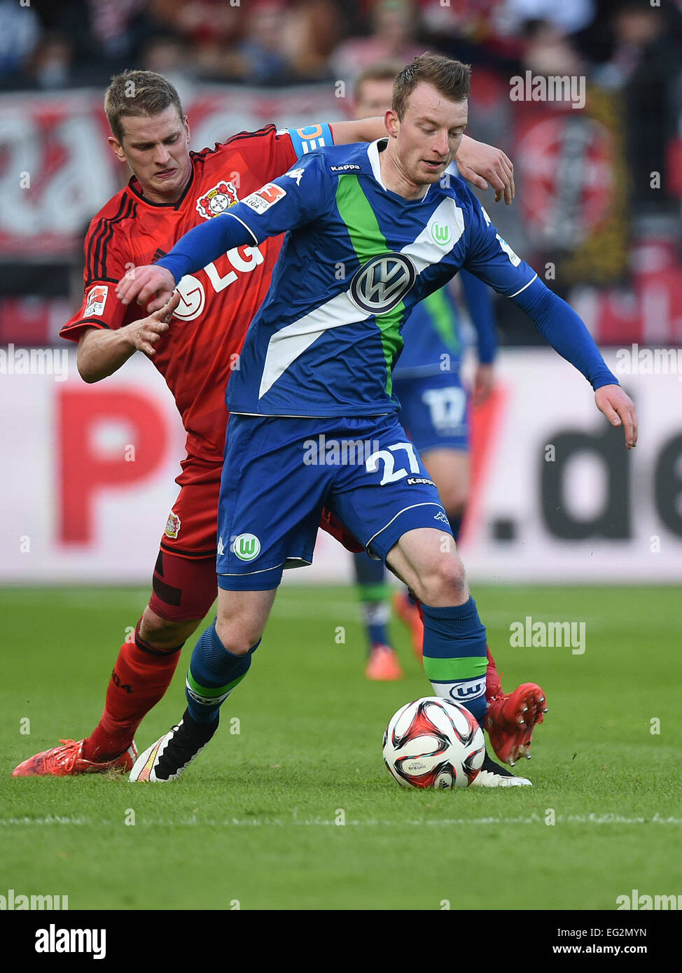 Leverkusen's Lars Bender (L) and Wolfsburg's Maximilian Arnold vie for ...