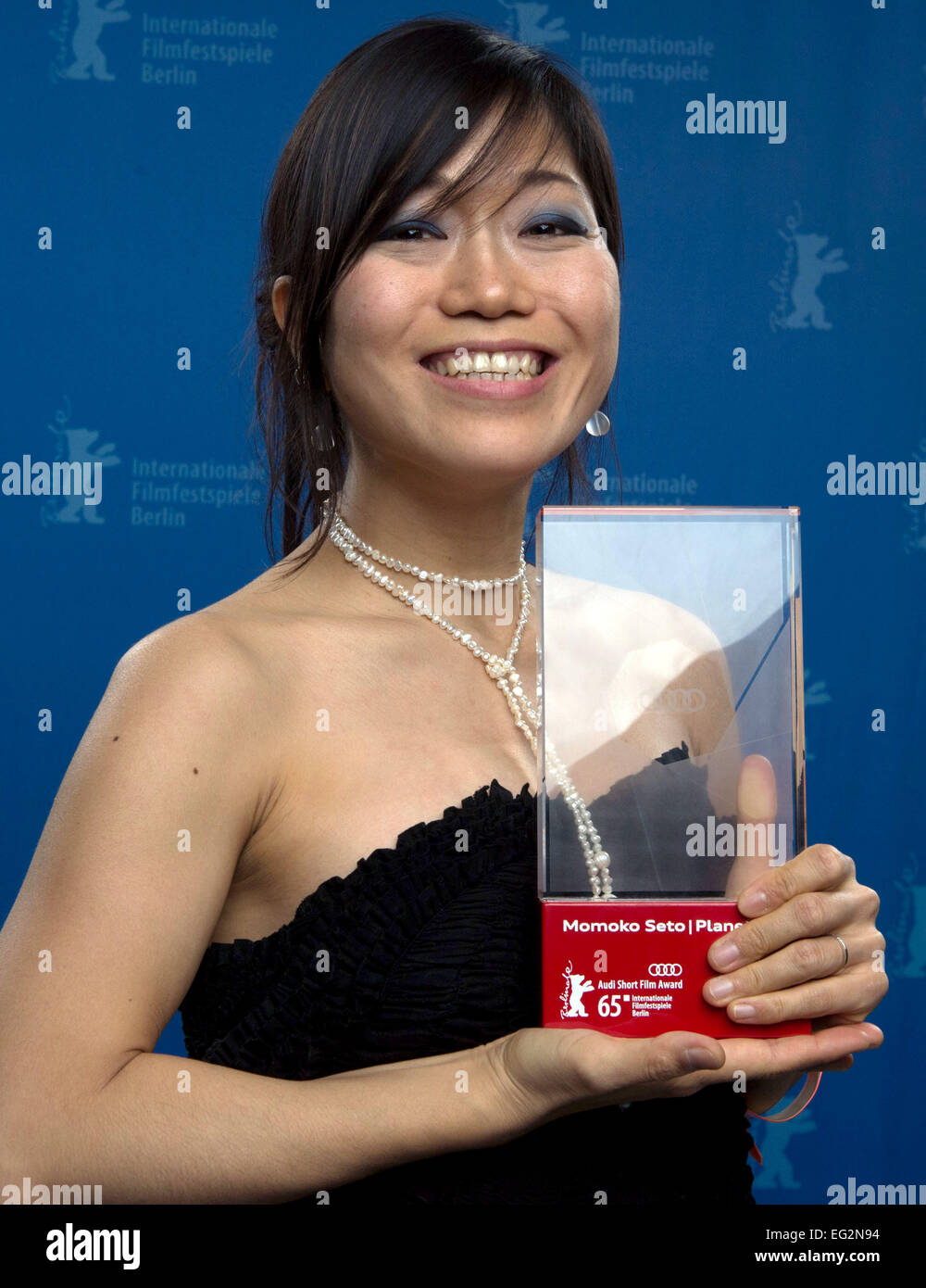 Berlin, Germany. 14th Feb, 2015. Momoko Seto holds up the Audi Short ...
