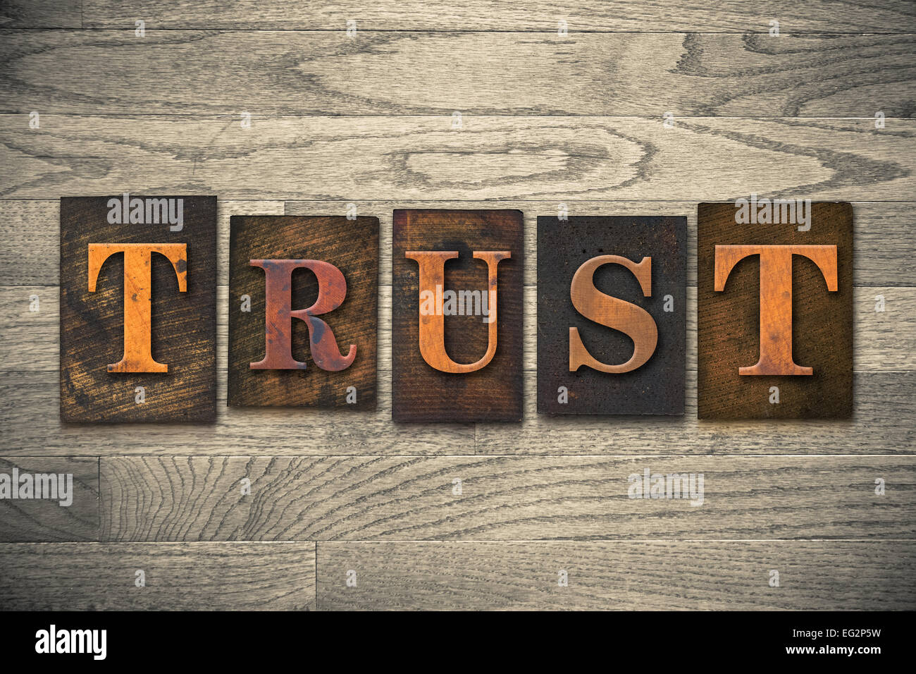 The word "TRUST" written in vintage wooden letterpress type Stock Photo ...