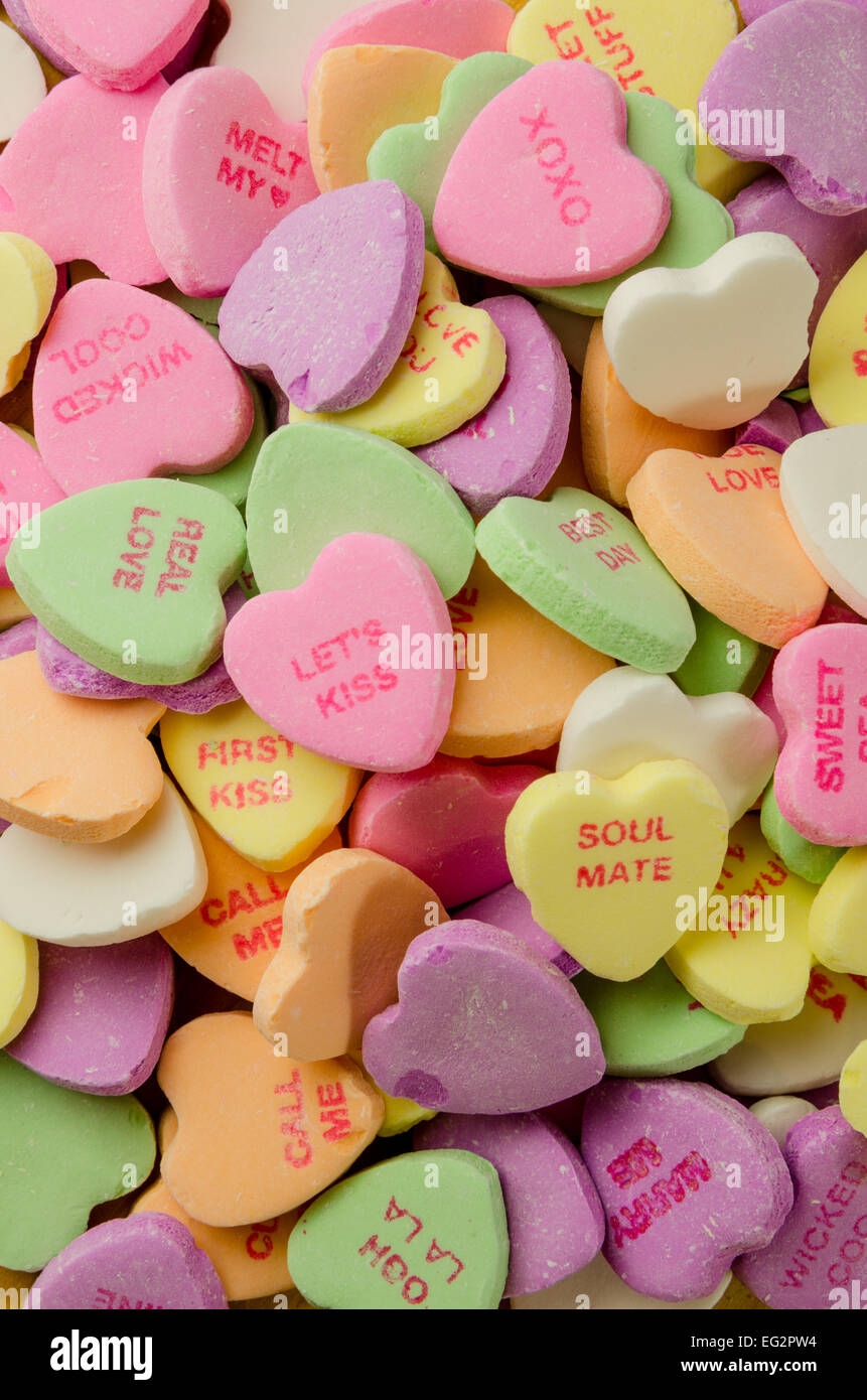 Multi colored candy with sweet romantic messages Stock Photo - Alamy