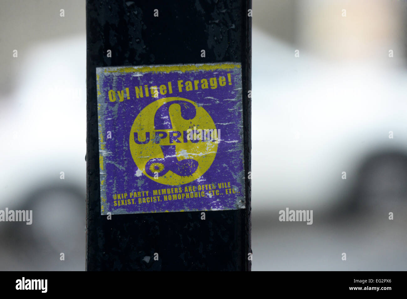 An anti-UKIP and Nigel Farage sticker pictured stuck onto a post in ...