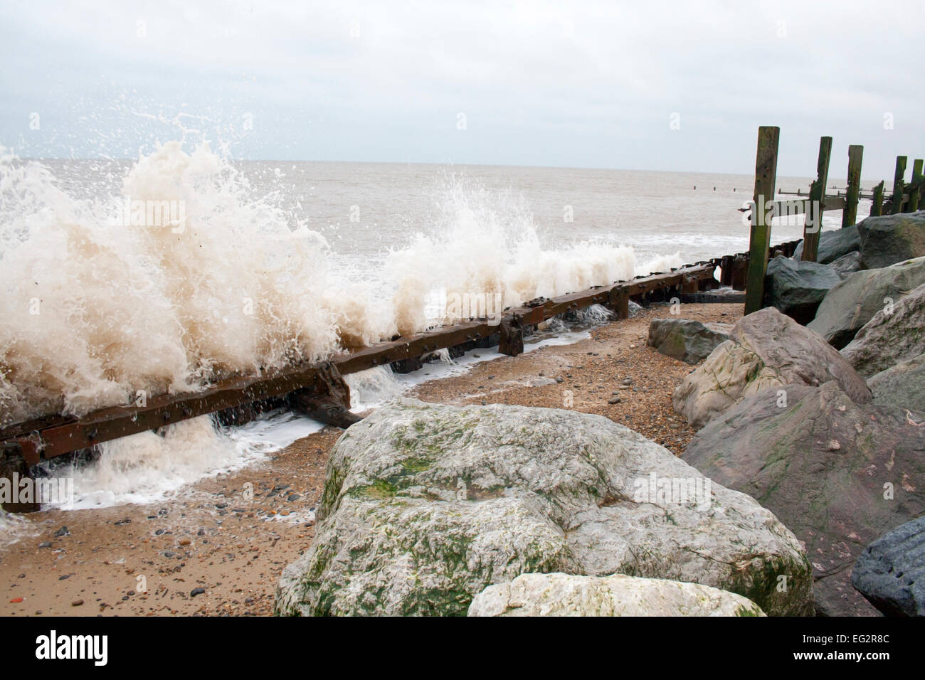 Waves and sea defense Stock Photo - Alamy