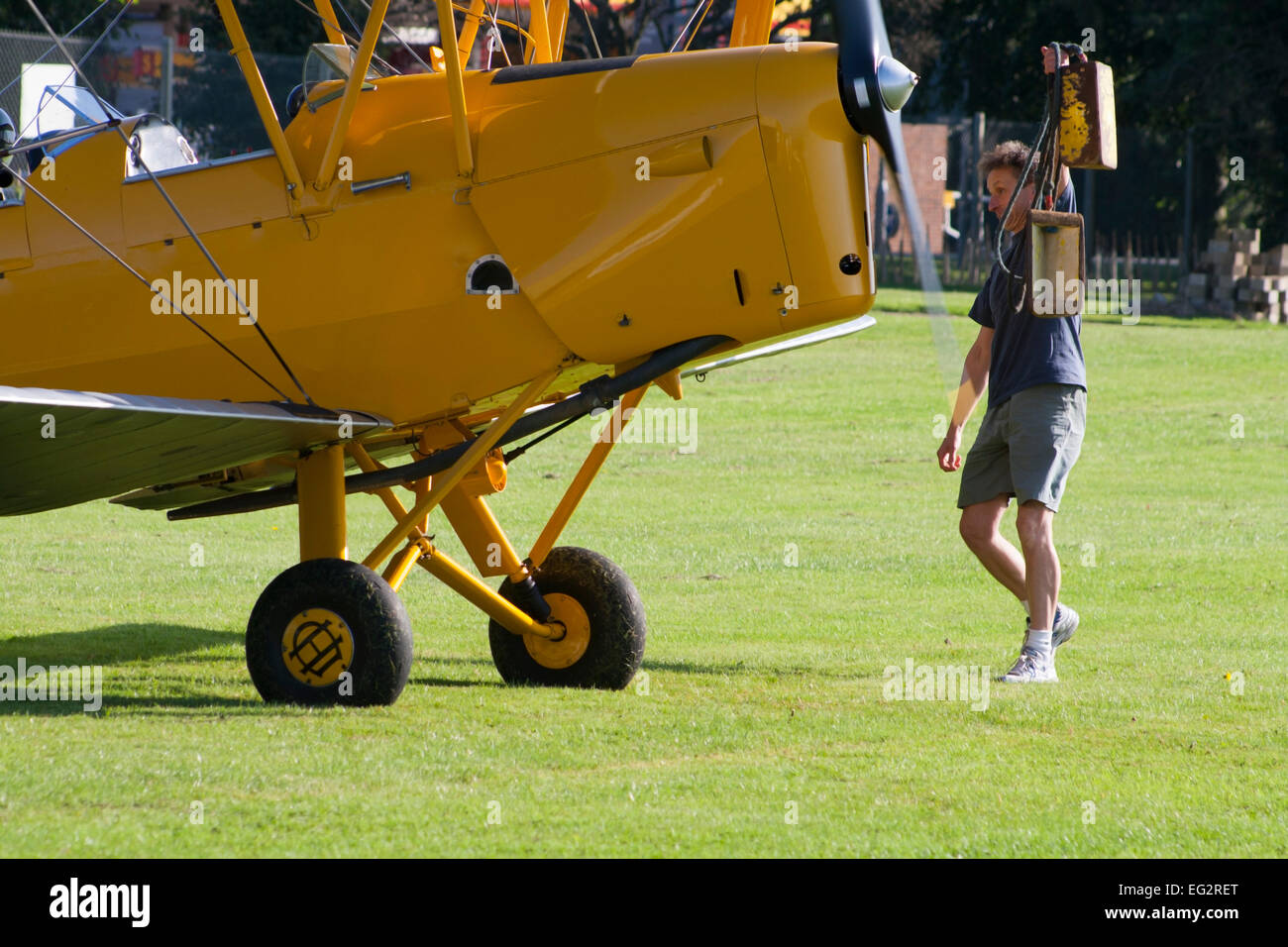 de Havilland Tiger Moth showing wheel chocks Stock Photo - Alamy