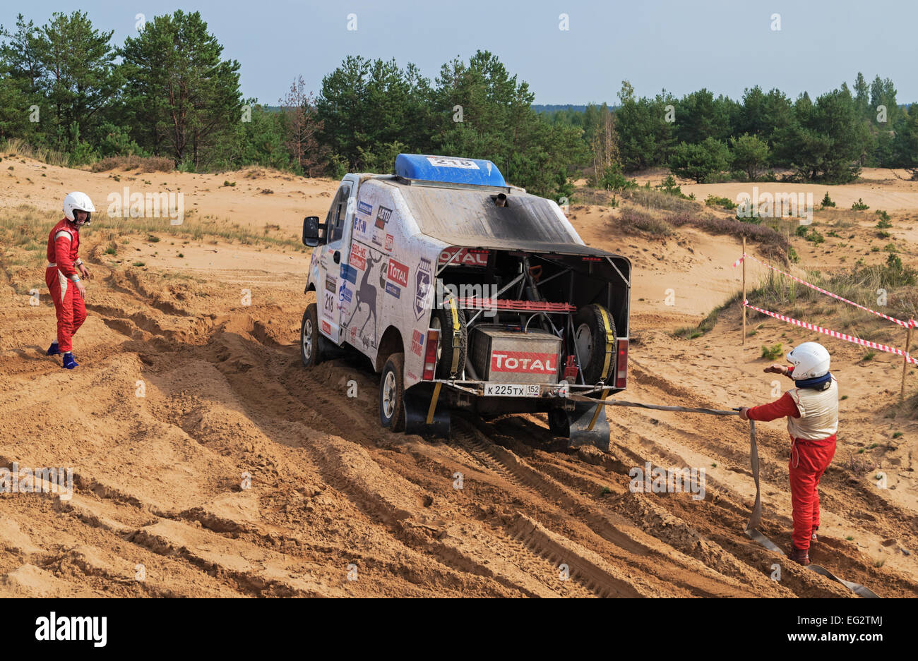 Races on a rally-raid on sandy dunes. Rally-raid Baha "Belarus" 2014 ...