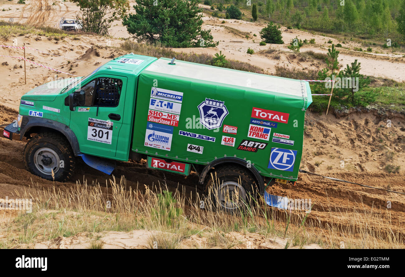 Races on a rally-raid on sandy dunes. Rally-raid Baha "Belarus" 2014 ...