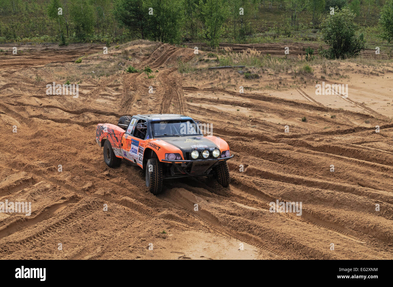 Races on a rally-raid on sandy dunes. Rally-raid Baha "Belarus" 2014 ...