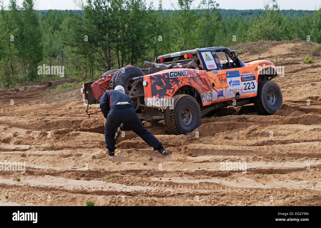 Races on a rally-raid on sandy dunes. Rally-raid Baha "Belarus" 2014 ...