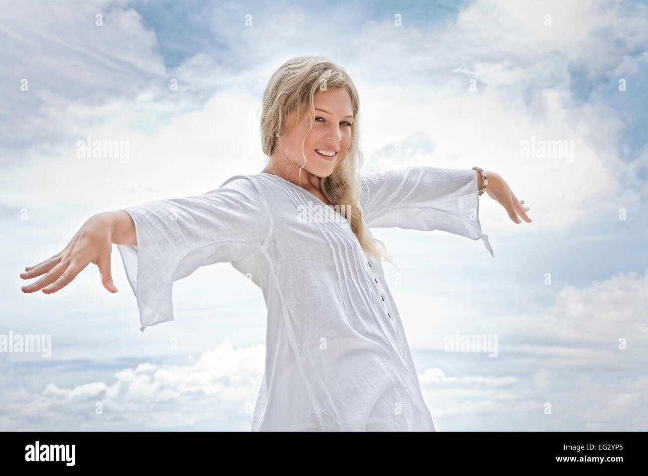 Portrait of nice young woman having good time on sky back Stock Photo ...