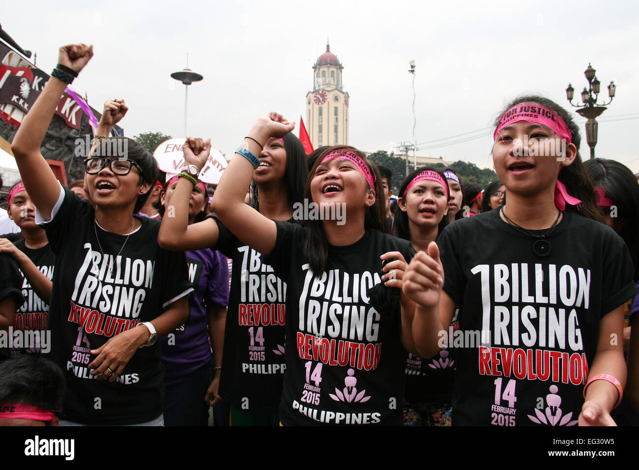 Manila, Philippines. 14th Feb, 2015. Participants raise their fists ...